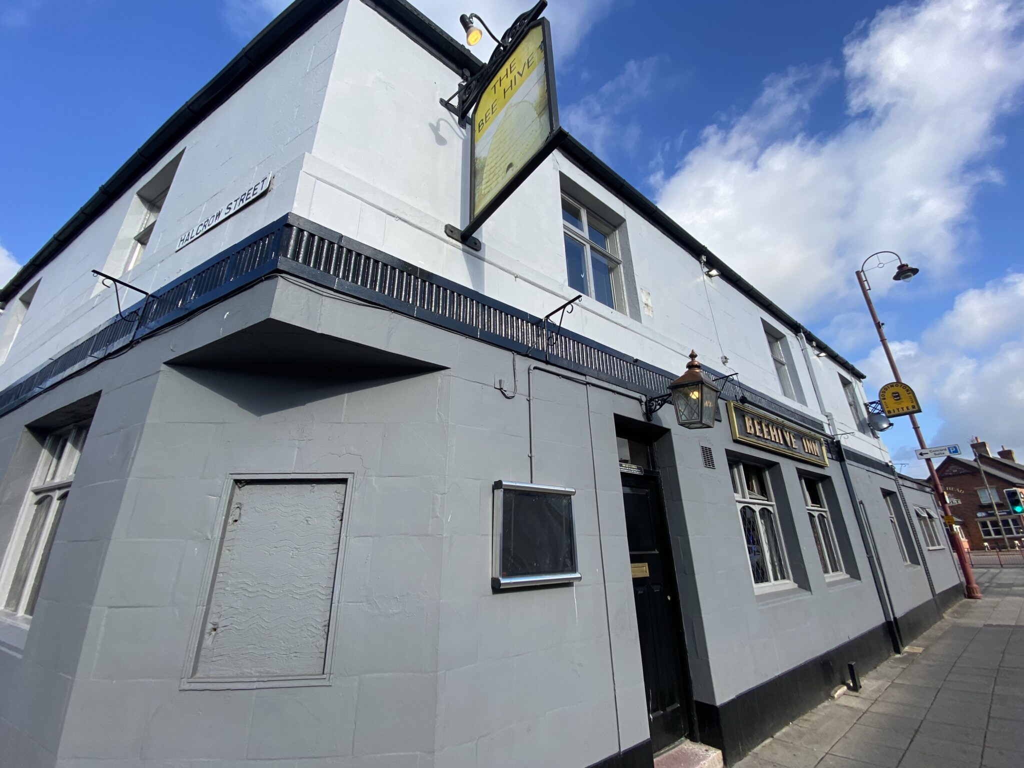 Man charged after three men allegedly slashed in Droylsden pub ...